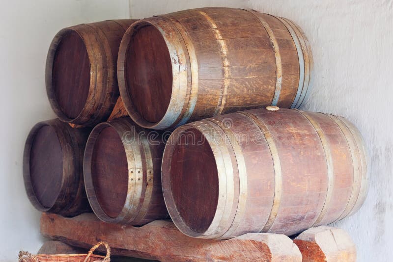 Old Wooden Barrels in Ancient Cellar. Vintage Barrels in Storage. Stock ...