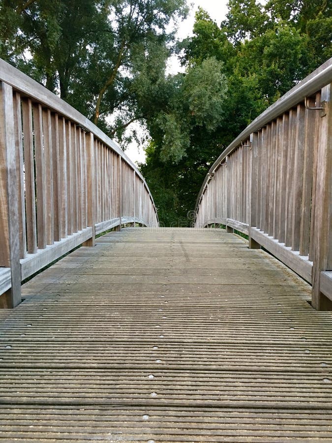 Old Wooden Bridge Over a Small River Stock Photo - Image of closeup ...