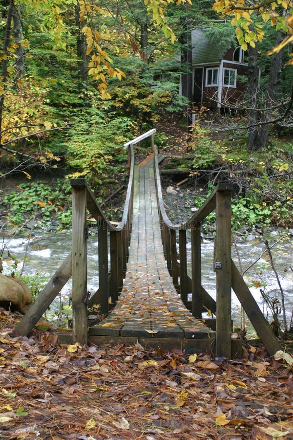 Old Wooden Bridge Over Stream Stock Photo - Image of season, stream ...