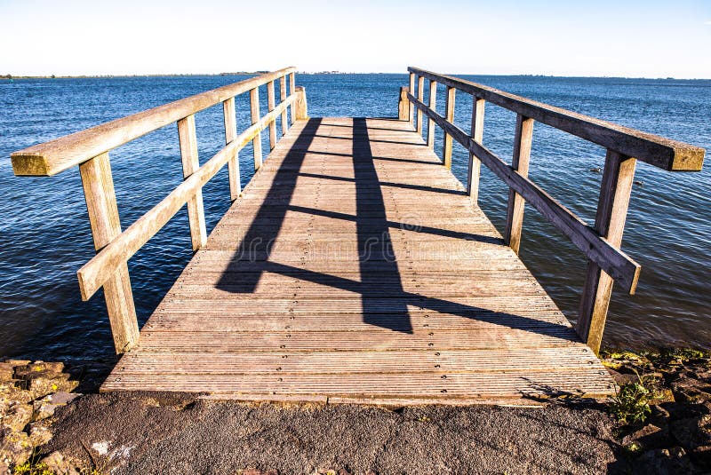 Old Wooden Bridge on a Pier. Stock Image - Image of brown, blue: 78405905