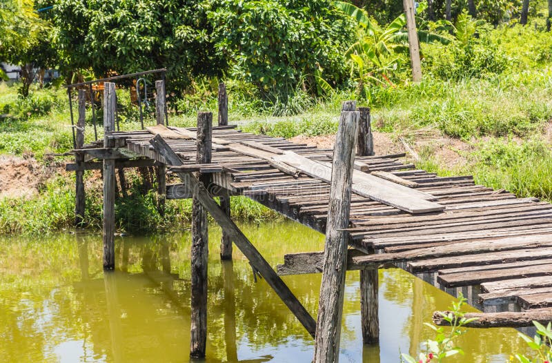 The old wooden bridge on stock image. Image of footbridge - 58677063