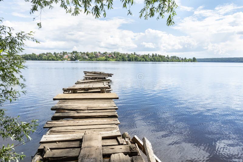 Old Wooden Bridge on the River Bank. Rustic Bridge of Boards Stock ...