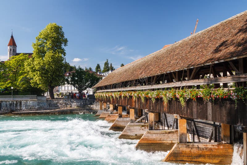 Old wooden bridge in Thun stock image. Image of sightseeing - 77812341