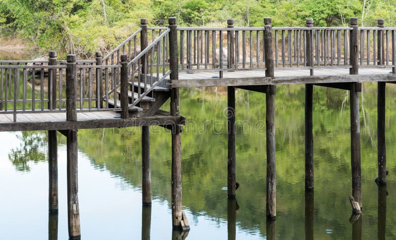 Old wooden bridge stock photo. Image of nature, reflection - 64820596