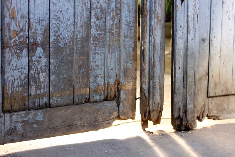 Old wooden broken doors stock image. Image of peeling - 91876383