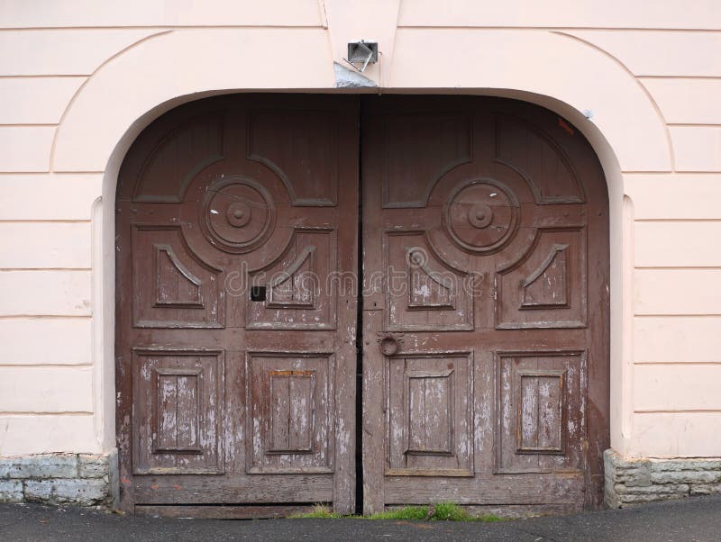 Old Wooden Brown Gate in a Light Wall Stock Photo - Image of light ...