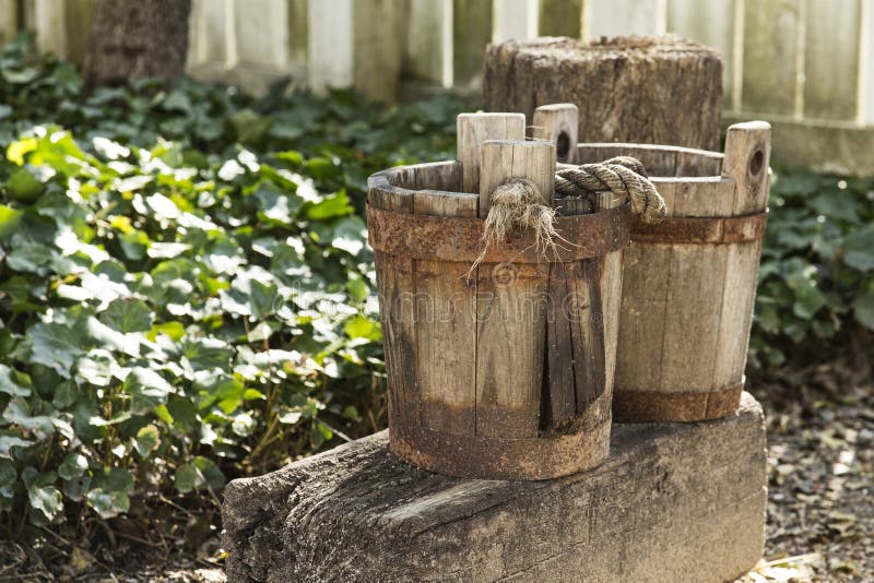 Old Wooden Buckets stock photo. Image of buckets, plant - 69538574