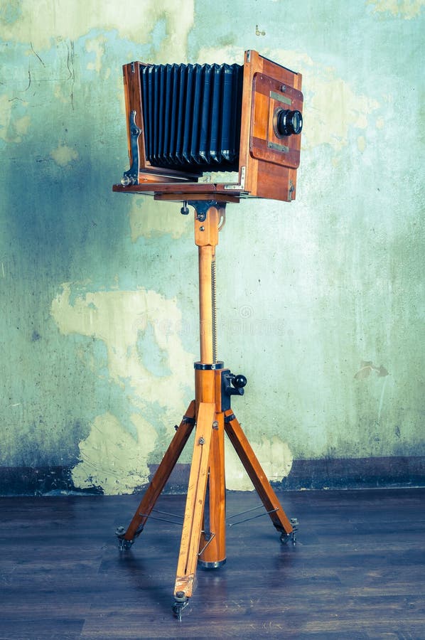 Wooden camera on tripod stock photo. Image of antique - 86468172