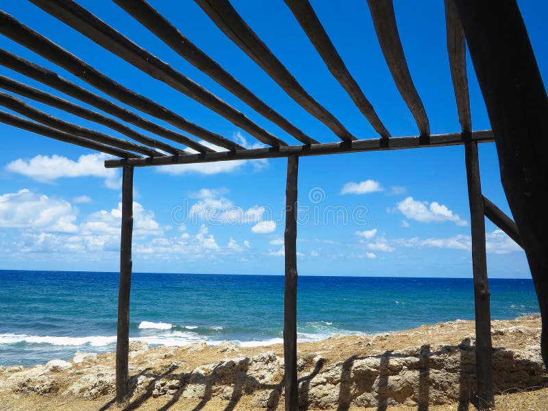Old Wooden Canopy on the Sea Coast and Blue Sky Stock Image - Image of ...