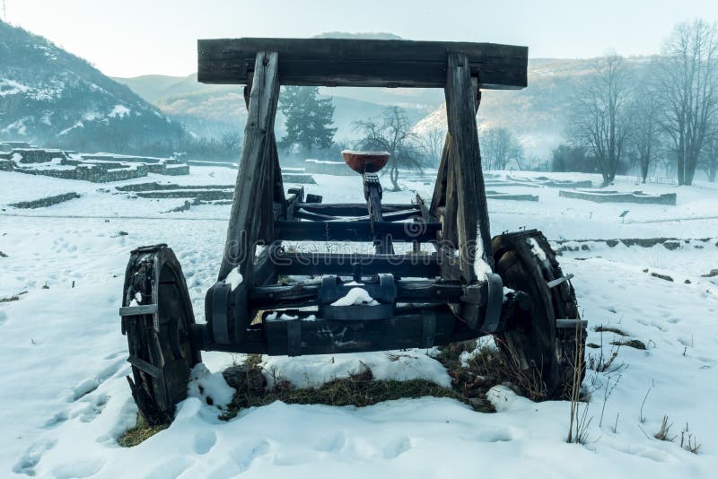 Old wooden catapult stock photo. Image of objects, snow - 66941794