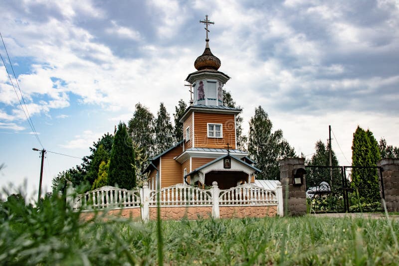 Old Wooden Church in the Background of Dark Clouds Stock Image - Image ...