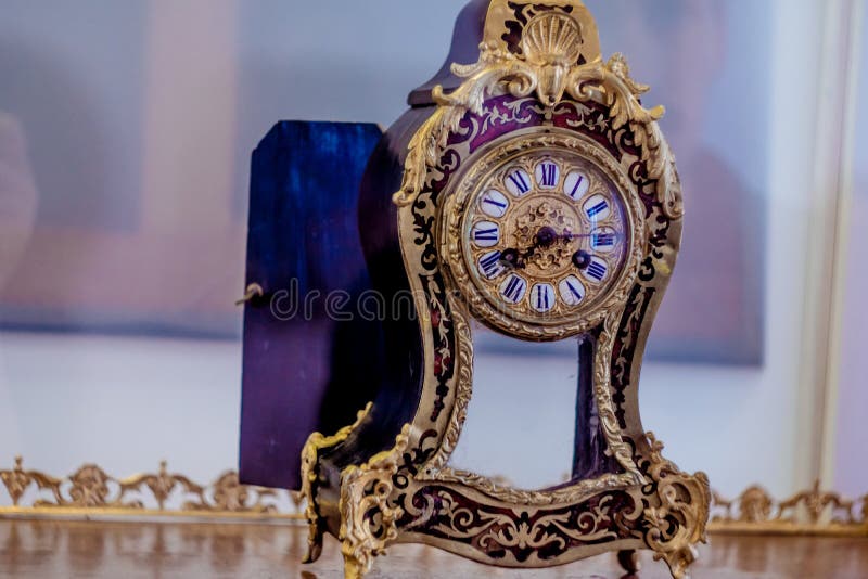 An Old Wooden Clock Stands on the Table Stock Image - Image of holidays ...