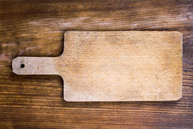 Old wooden cutting board stock photo. Image of table - 58552486