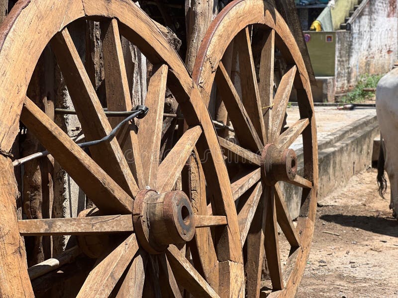 Old Wooden Decorative Wagon Wheel in a Barn Stock Photo - Image of ...