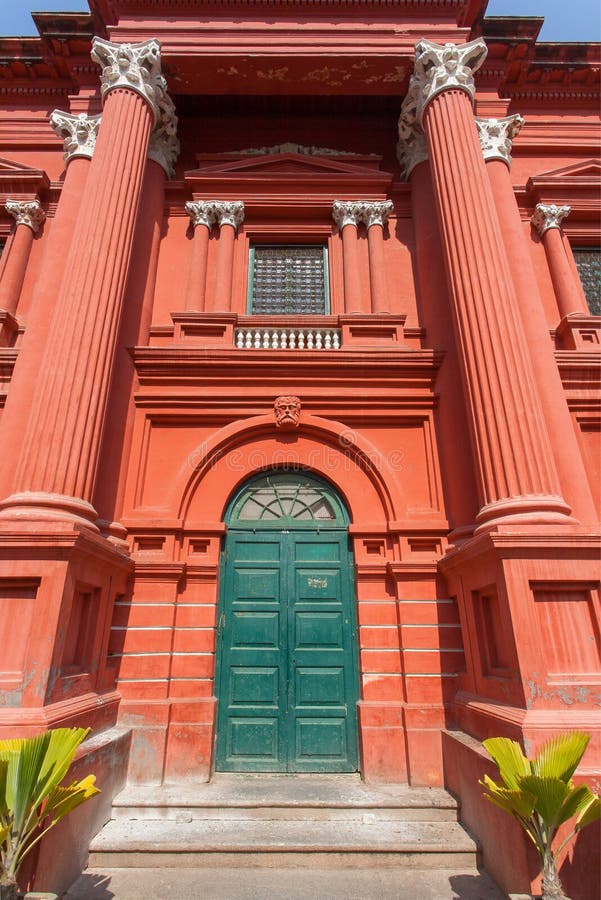 Old Wooden Door in Huge Red Historical Building. Stock Photo - Image of ...