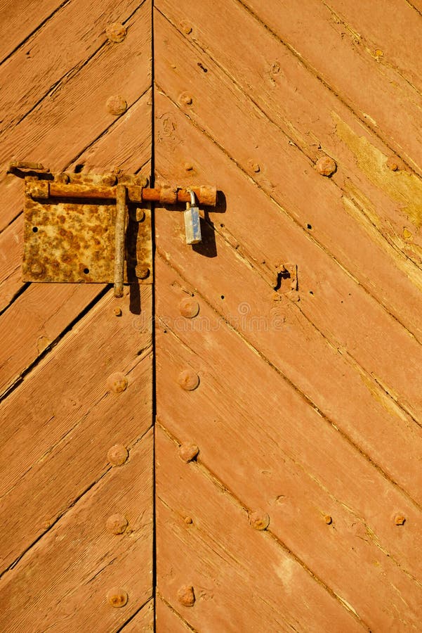 Old Wooden Door with Rustic Lock Stock Photo - Image of grunge, lock ...