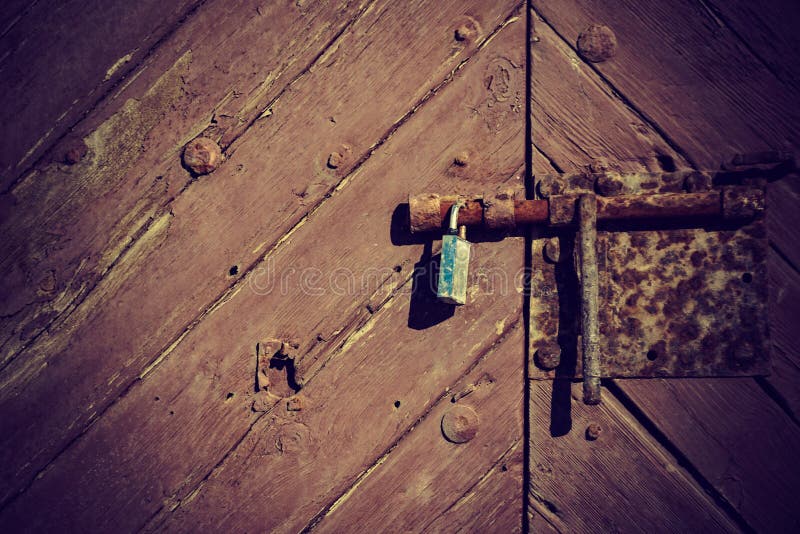 Old Wooden Door with Rustic Lock Stock Image - Image of bolt, grunge ...
