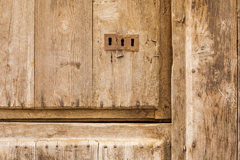 An Old Wooden Door with Three Locks Stock Photo - Image of board ...