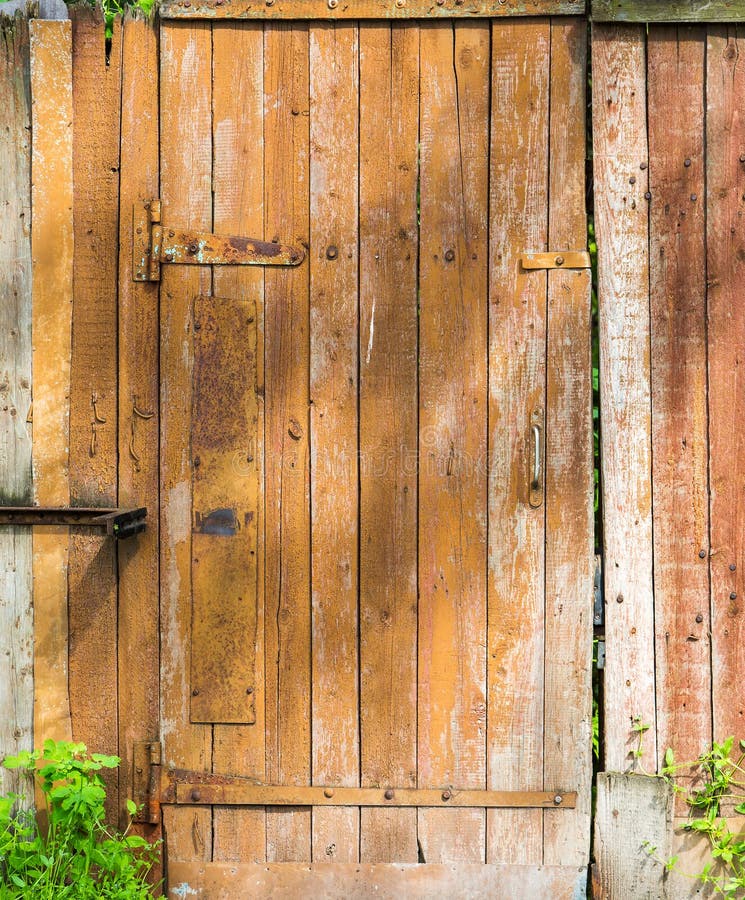 Old rustic wooden doors stock image. Image of estate - 29071081
