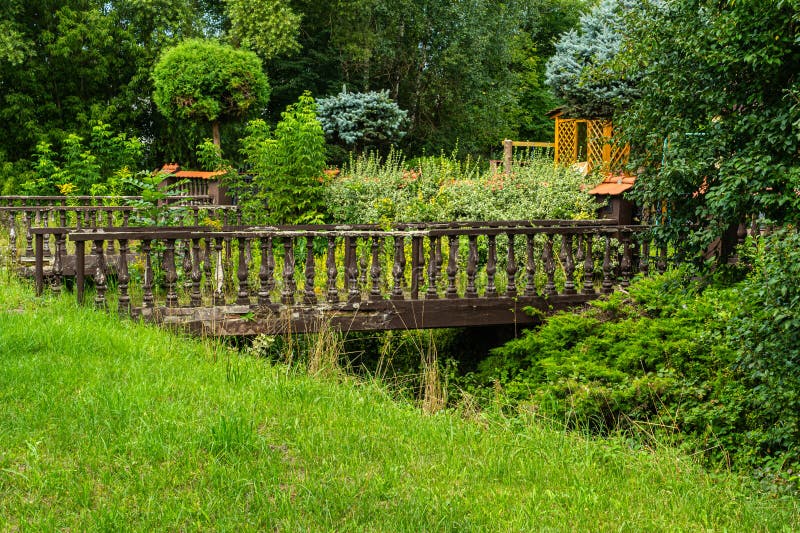 A old wooden footbridge stock image. Image of bridge - 356778117
