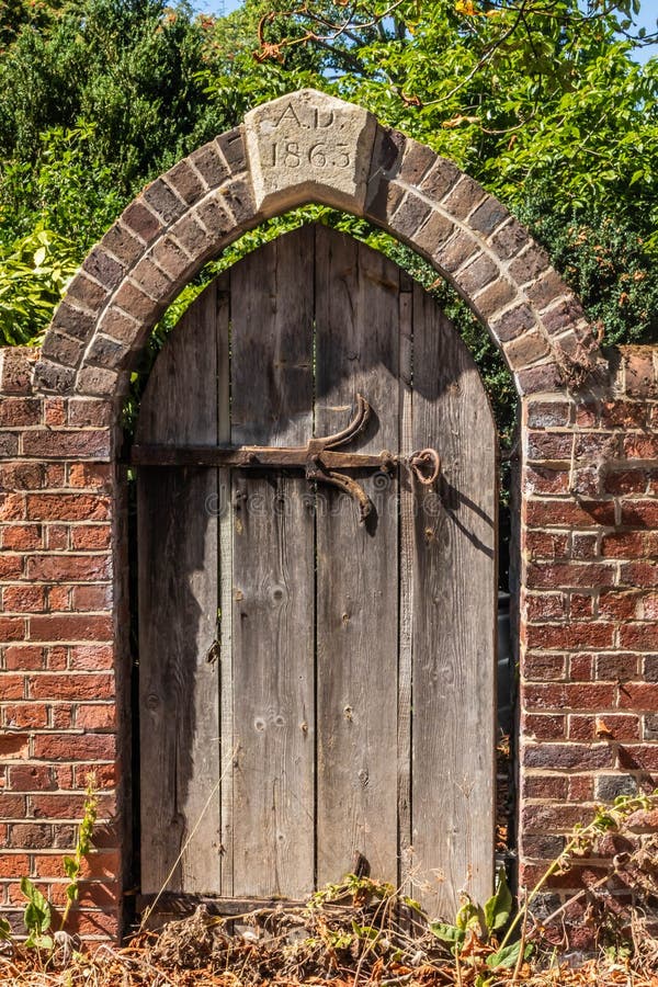 Old Wooden Gate with Wrought Iron Fittings Stock Image - Image of ...