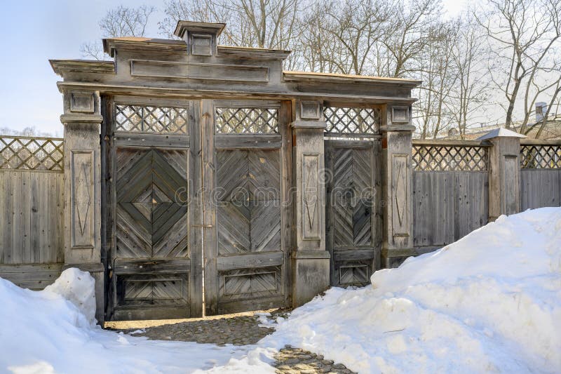 Old Wooden Gates among Melting Snowdrifts in Spring Stock Photo - Image ...