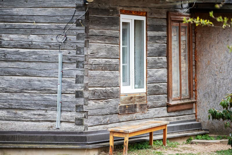 Old Wooden House with Wooden Bench Near the House Stock Photo - Image ...