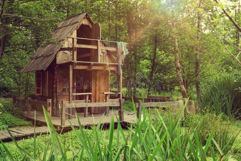 Old Wooden Hut in Beautiful Tranquil Forest Stock Image - Image of ...