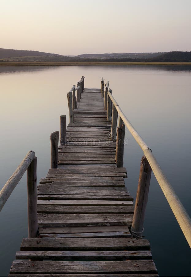 Old Wooden Jetty Leading into a Calm River Stock Image - Image of ...