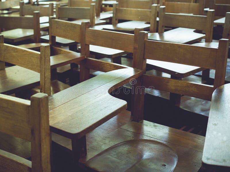 Wooden Lecture Chairs Arranged in the Classroom. Empty College ...