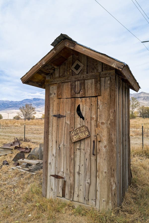 An Old Wooden Outhouse with an Out of Order Sign Stock Image - Image of ...