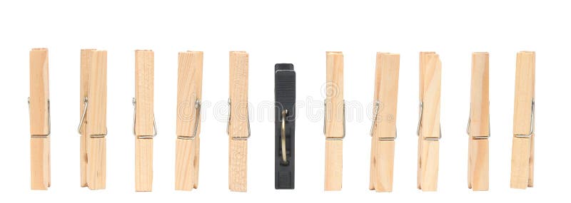 Old Wooden Pins and One Black Plastic Pin Stock Image - Image of ...