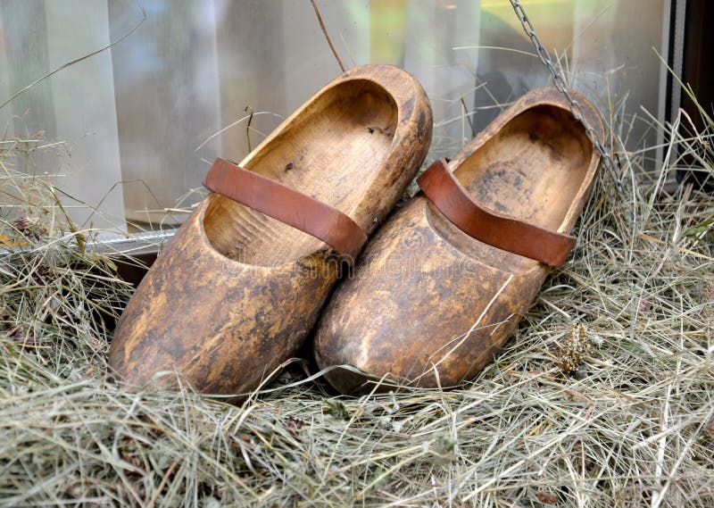 Old Wooden Shoes Lie on the Hay Stock Photo - Image of traditional ...