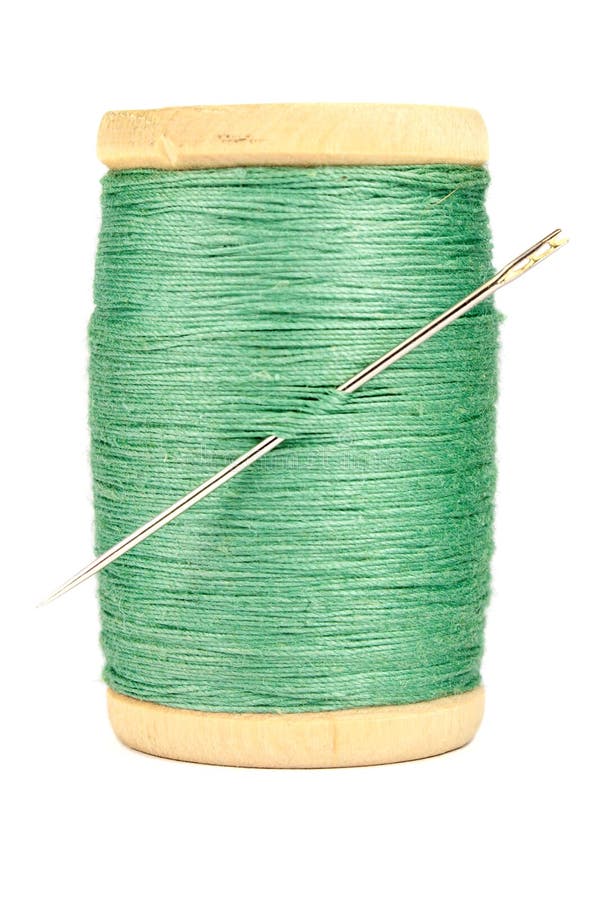Old Wooden Spool of Thread and Needle on White Background Stock Photo ...