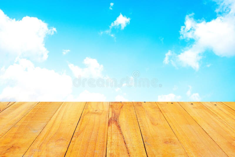 Old Wooden Table with Blue Sky White Cloud Background Stock Photo ...