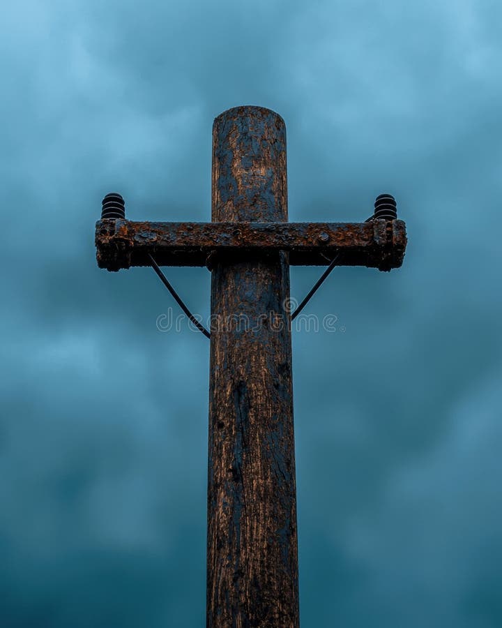 An Old Wooden Utility Pole Stands Against a Cloudy Sky. Stock ...