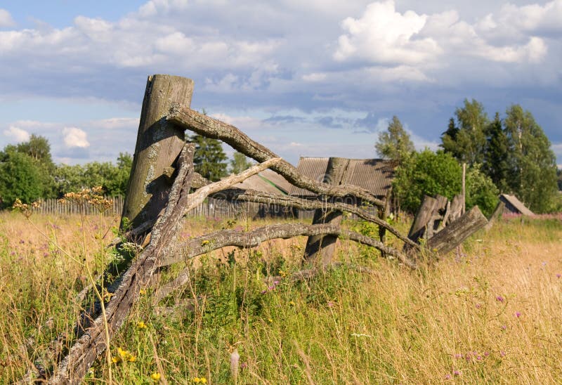 Old wooden village fence. stock photo. Image of flower - 7551624