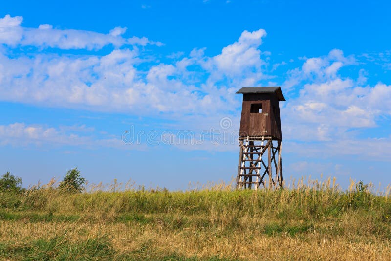 Old wooden watch tower stock photo. Image of clouds, reed - 15900574