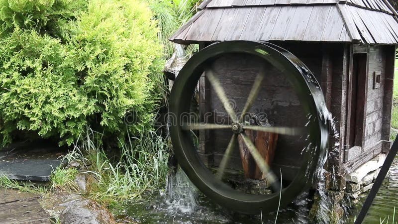 Old Water Mill Still Working. Wooden Wheels of Old Mill are Rotating ...