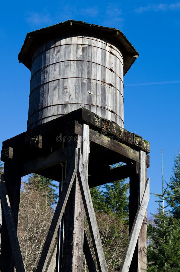 Old Wooden Water Tower Under Blue Sky Stock Image - Image of water ...