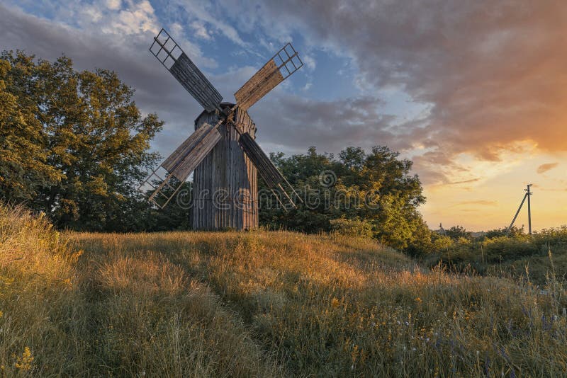 Old Wooden Windmill at Dramatic Sunset, Historic Outdoor Background ...