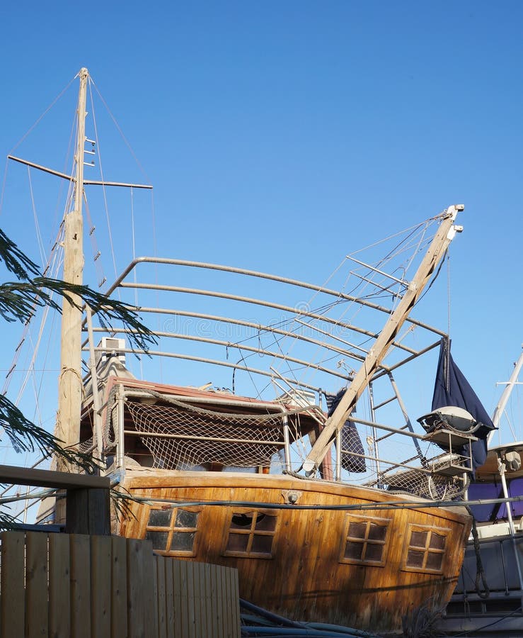 Old wooden yachts in dock stock photo. Image of caravel - 104867650