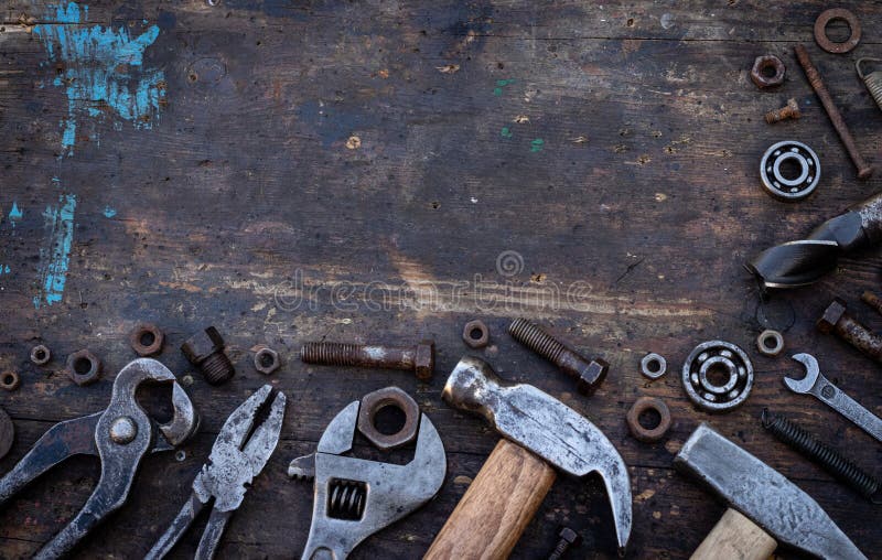 Old Work Tools Nuts, Bolts and Bearings Lie on a Wooden Workbench Stock ...