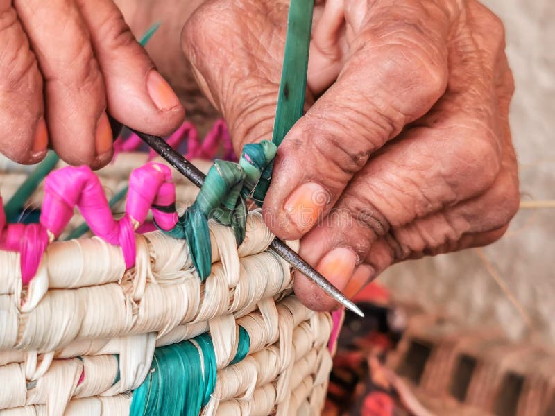 An Old Working Woman and Making Handcraft by Dried Palm Tree Leaves ...
