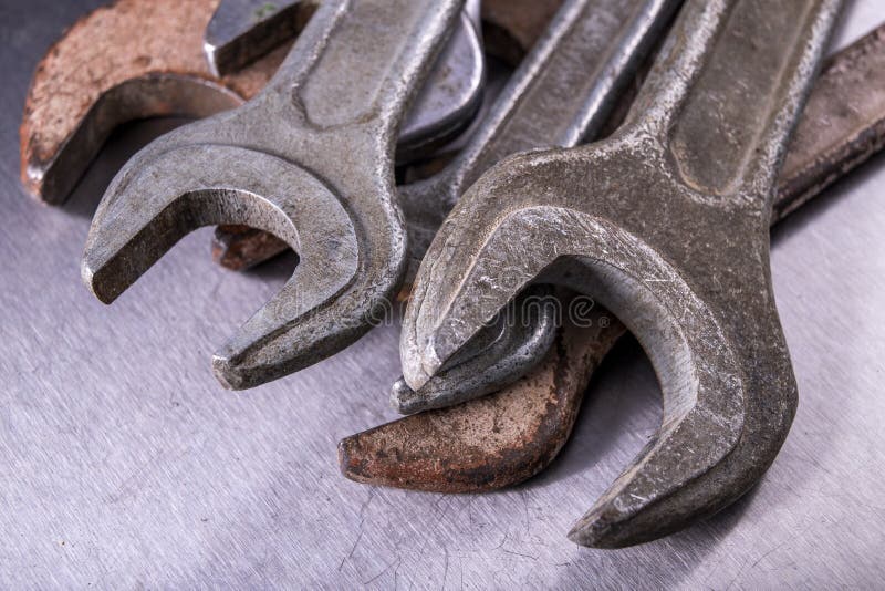 Old Workshop Keys Stacked on a Metal Table. Locksmith Accessories for ...