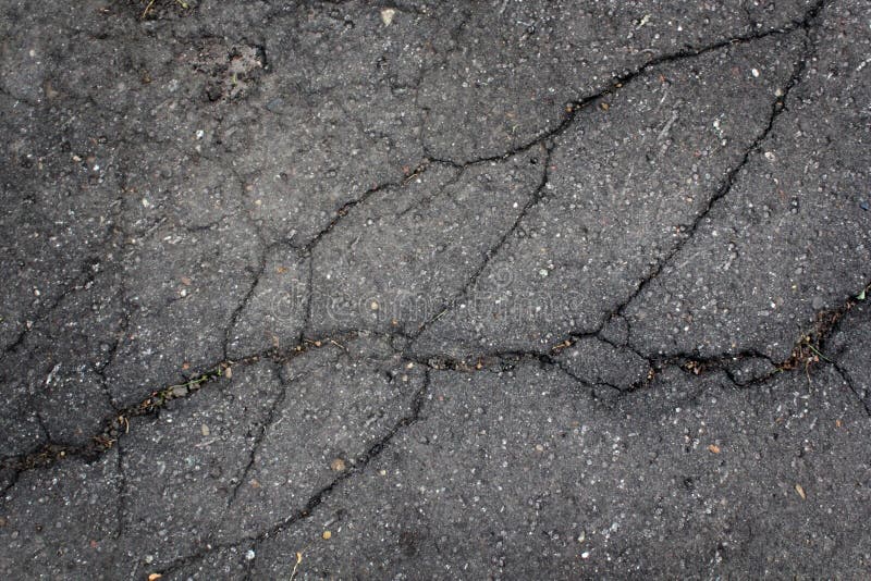 Old Worn and Cracked Asphalt with Cracks. Urban Texture. a Smooth Dark ...