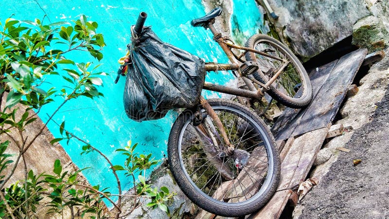 Old and worn out bicycle stock image. Image of worn - 266033829