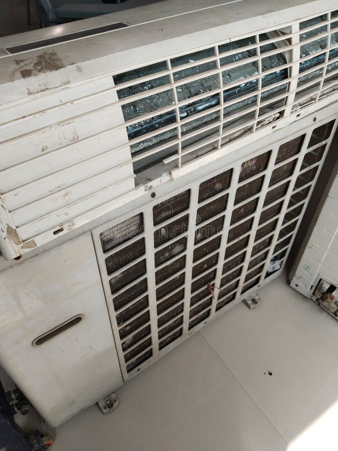 Old and Worn Out a Condensing Unit and Indoor Unit of the Air ...