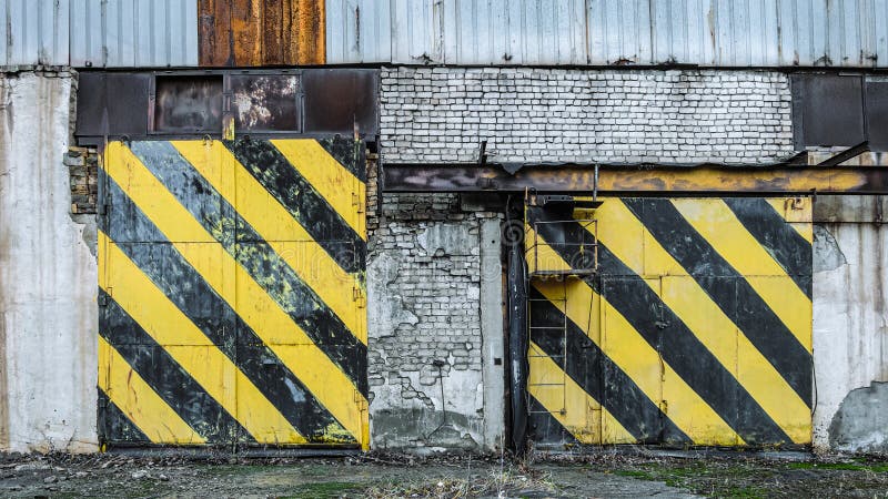 Old Worn Out Gates on the Facade of an Industrial Building Workshop ...