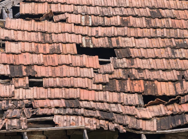 Old Worn Out Red Brick Roof with Missing Tiles Stock Photo - Image of ...